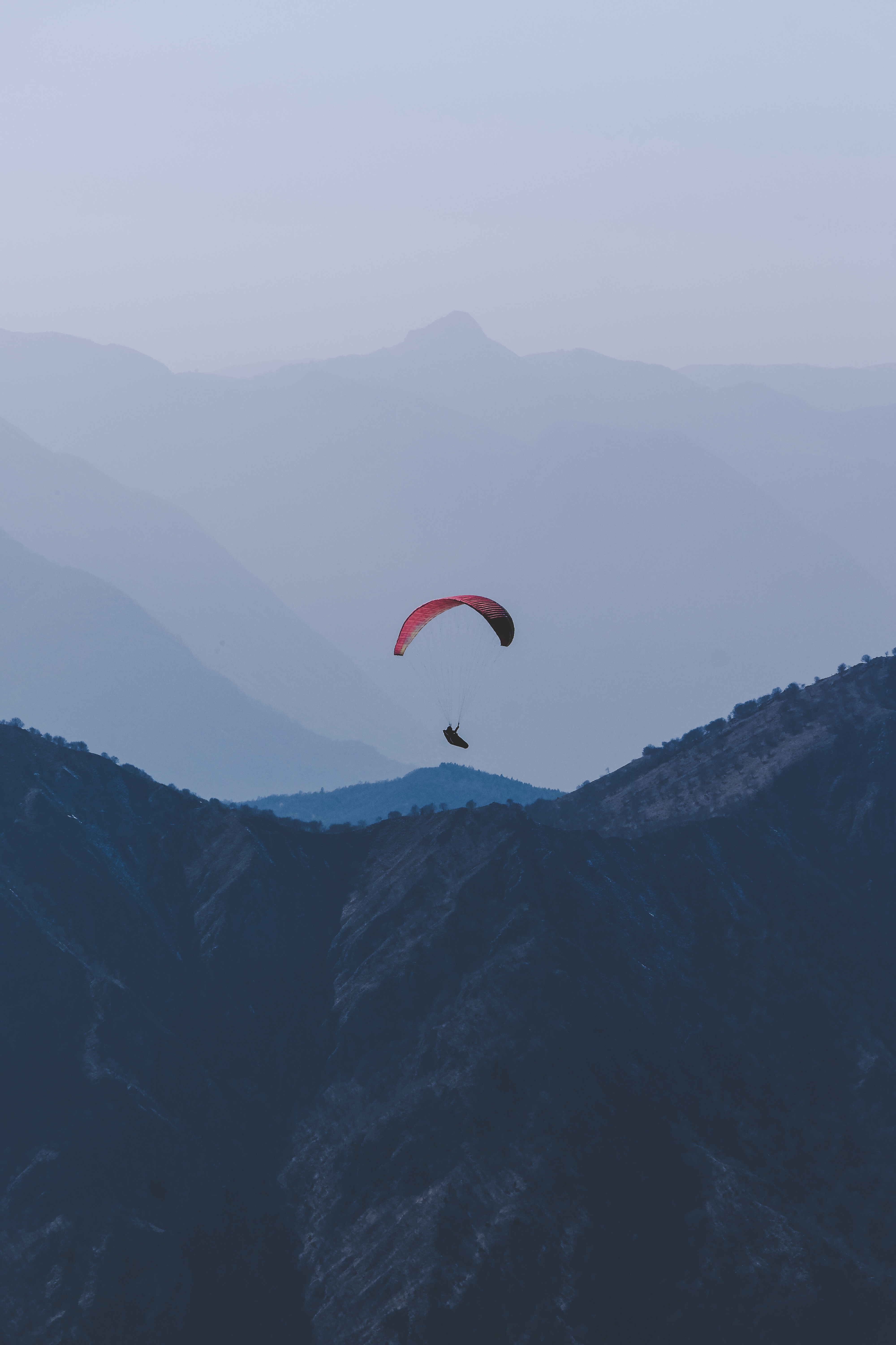 Wallpaper Person in Orange Parachute Over Green Mountains During ...